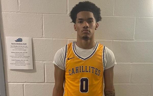 Reed comes up clutch as Roman survives scare from Carroll